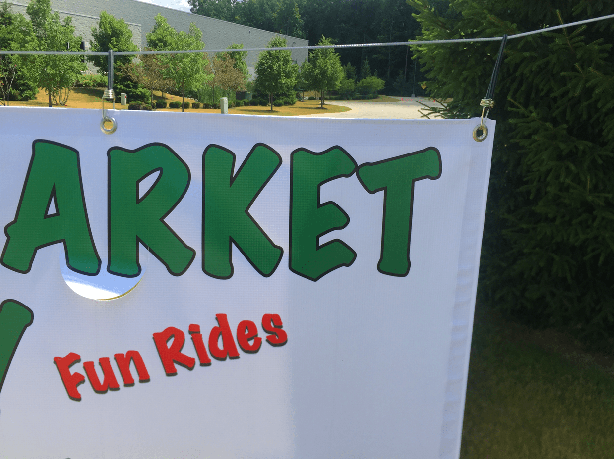 Over the street vinyl banners | Installation & design